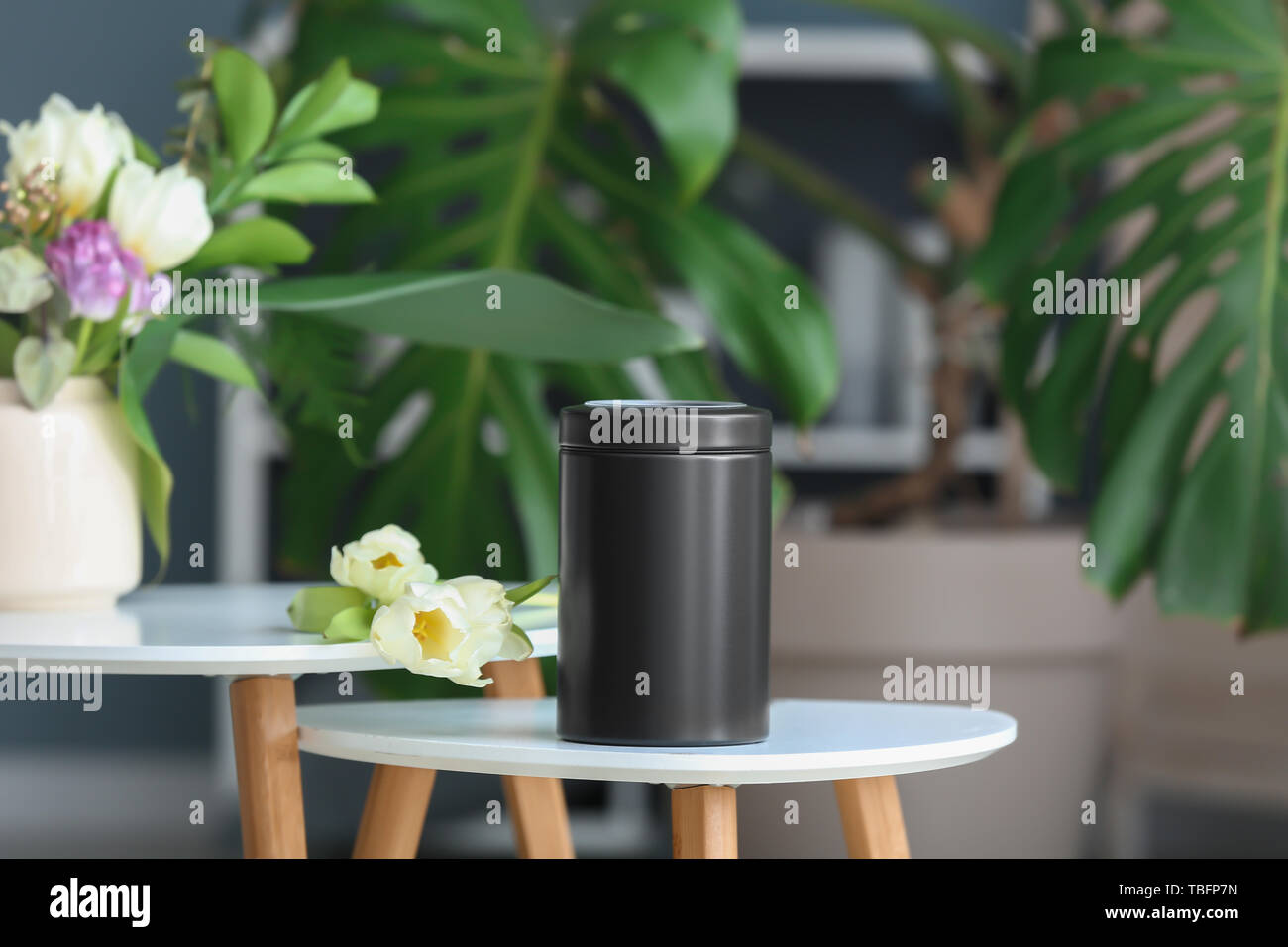 Mortuary urn on table in room Stock Photo - Alamy
