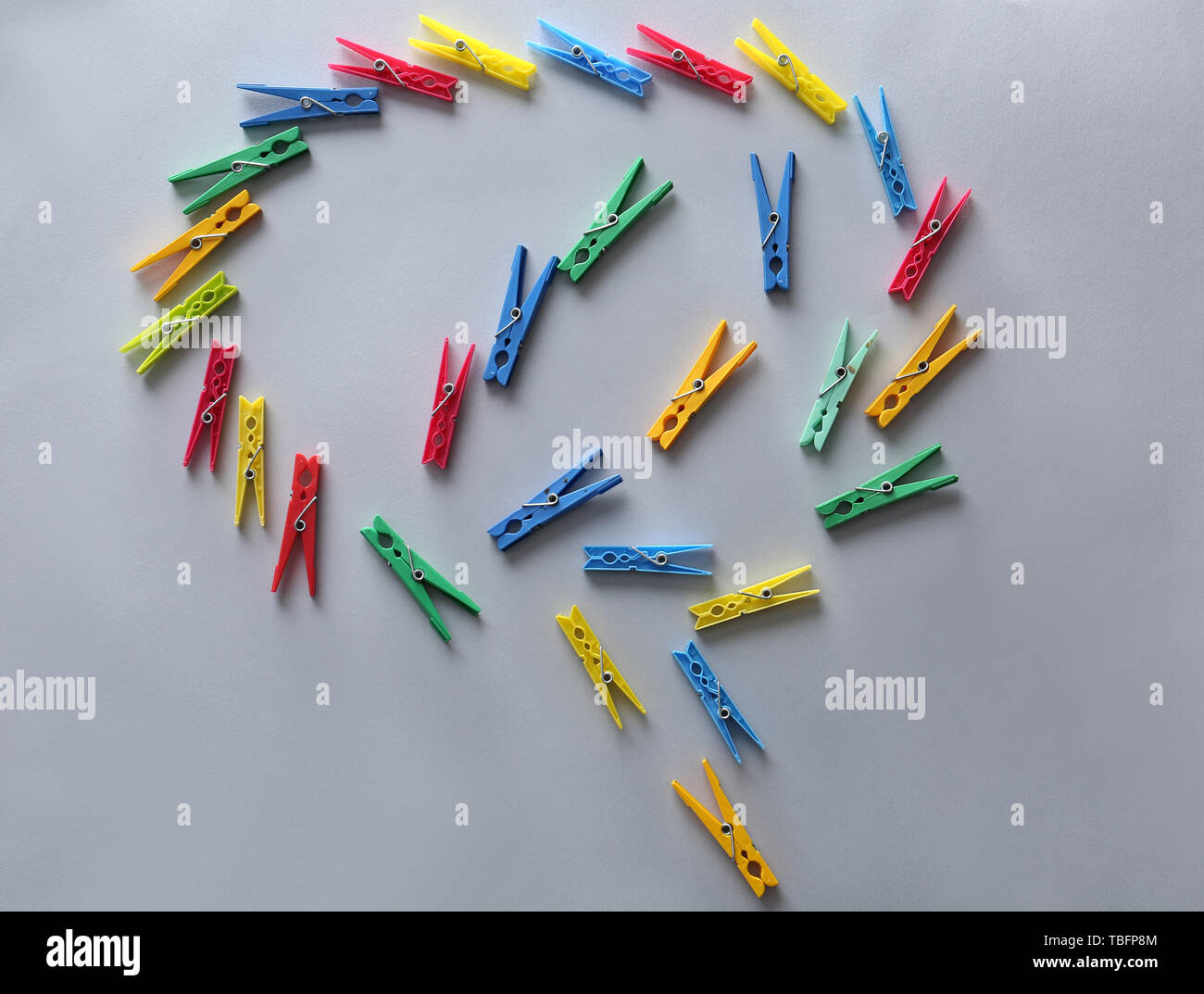 Human brain made of clothes pegs on grey background Stock Photo - Alamy