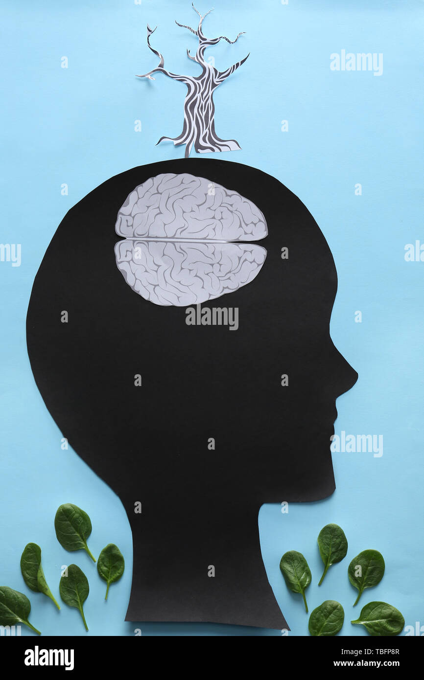 Creative composition with human head and brains on color background ...