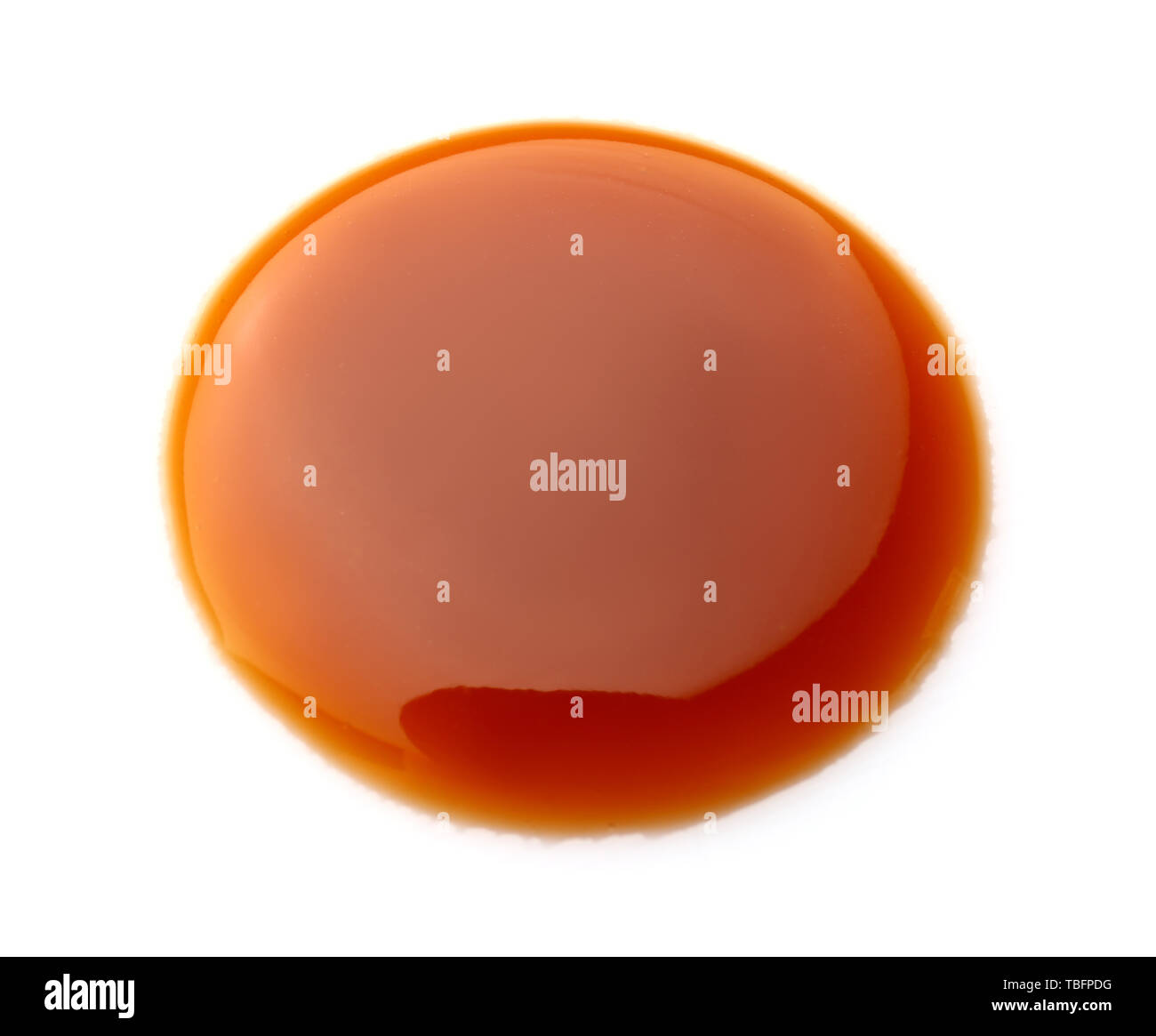 Liquid caramel on white background Stock Photo - Alamy