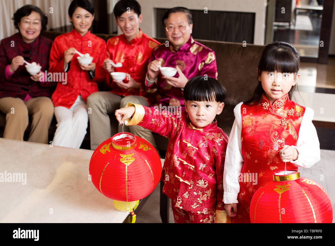 The whole family spent the Lantern Festival together Stock Photo - Alamy