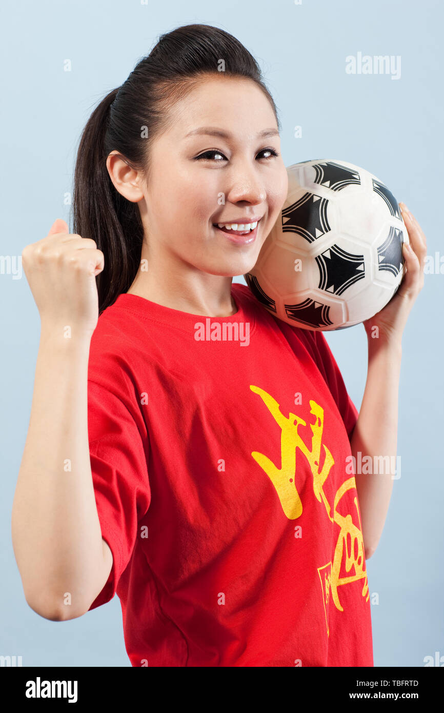 Cheerleaders cheer for China Stock Photo - Alamy