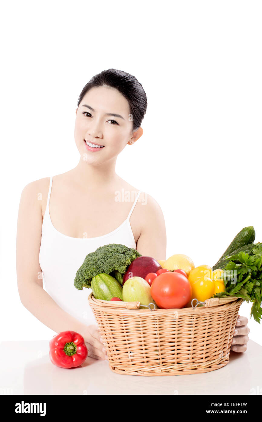 A girl with fresh fruits and vegetables Stock Photo - Alamy