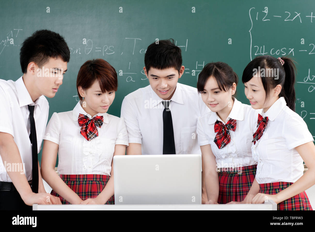 Teamwork among high school students Stock Photo - Alamy