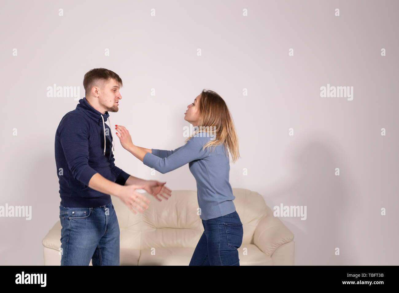 people, violence and abuse concept - angry man hitting woman Stock ...