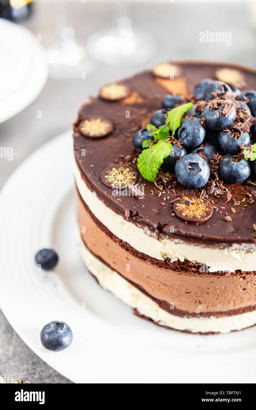Belgian Chocolate Layered Gateau. Layers of moist choco sponge, vanilla ...