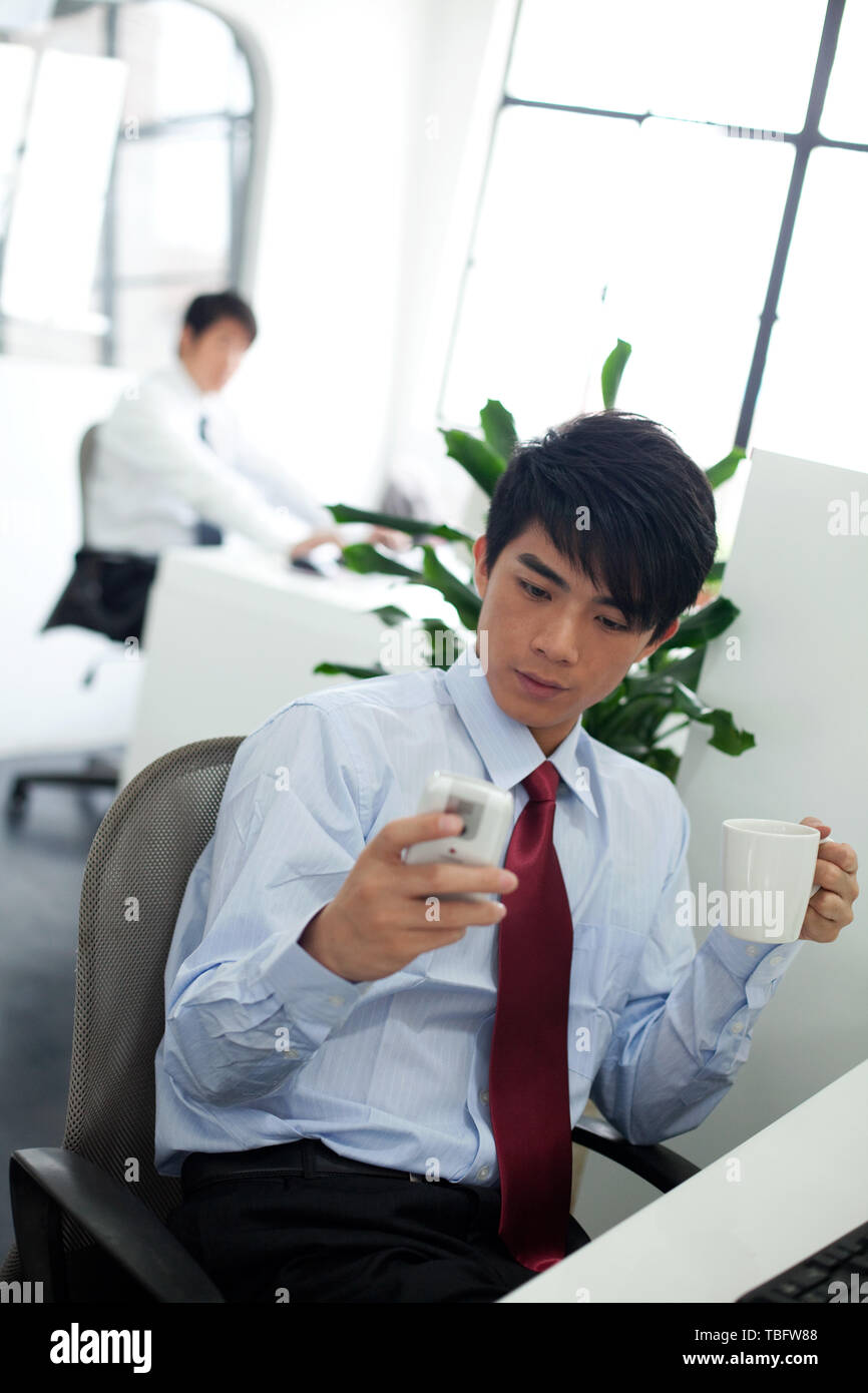 A white-collar man in front of a computer Stock Photo - Alamy