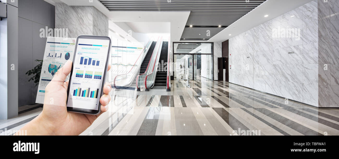 mobile phone with mobile office in modern hall Stock Photo - Alamy