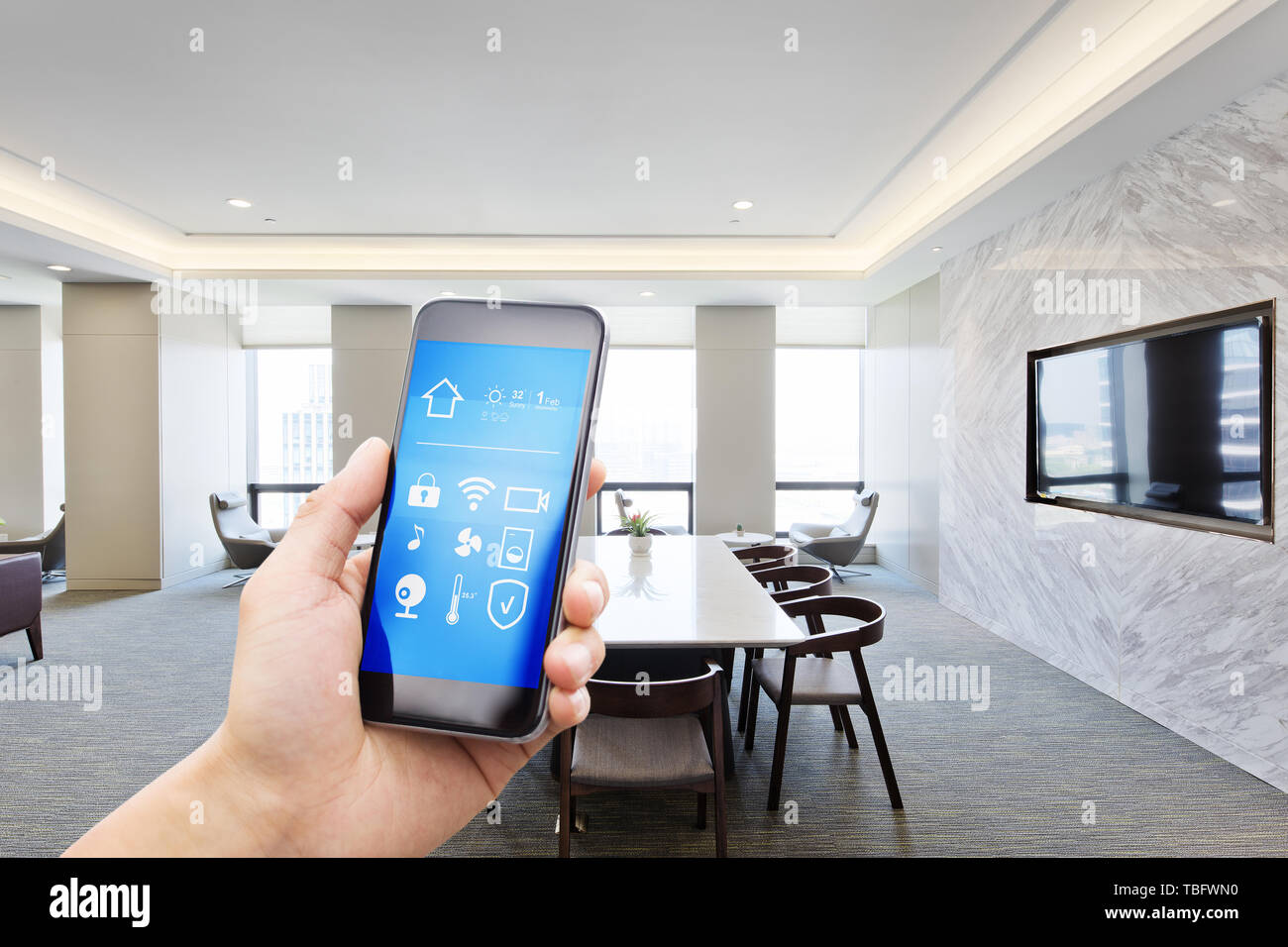 Mobile phone in modern meeting room Stock Photo - Alamy