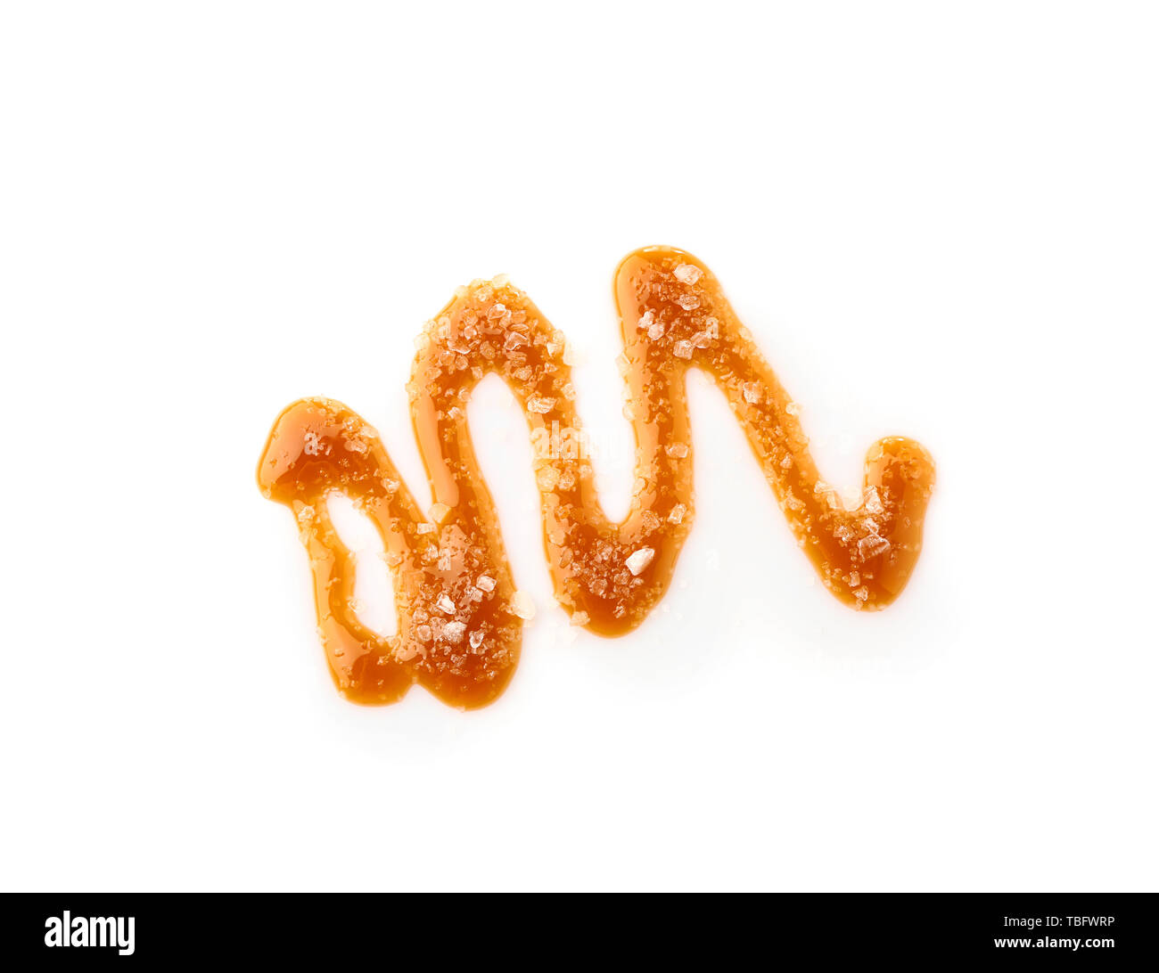 Tasty salted caramel on white background Stock Photo - Alamy