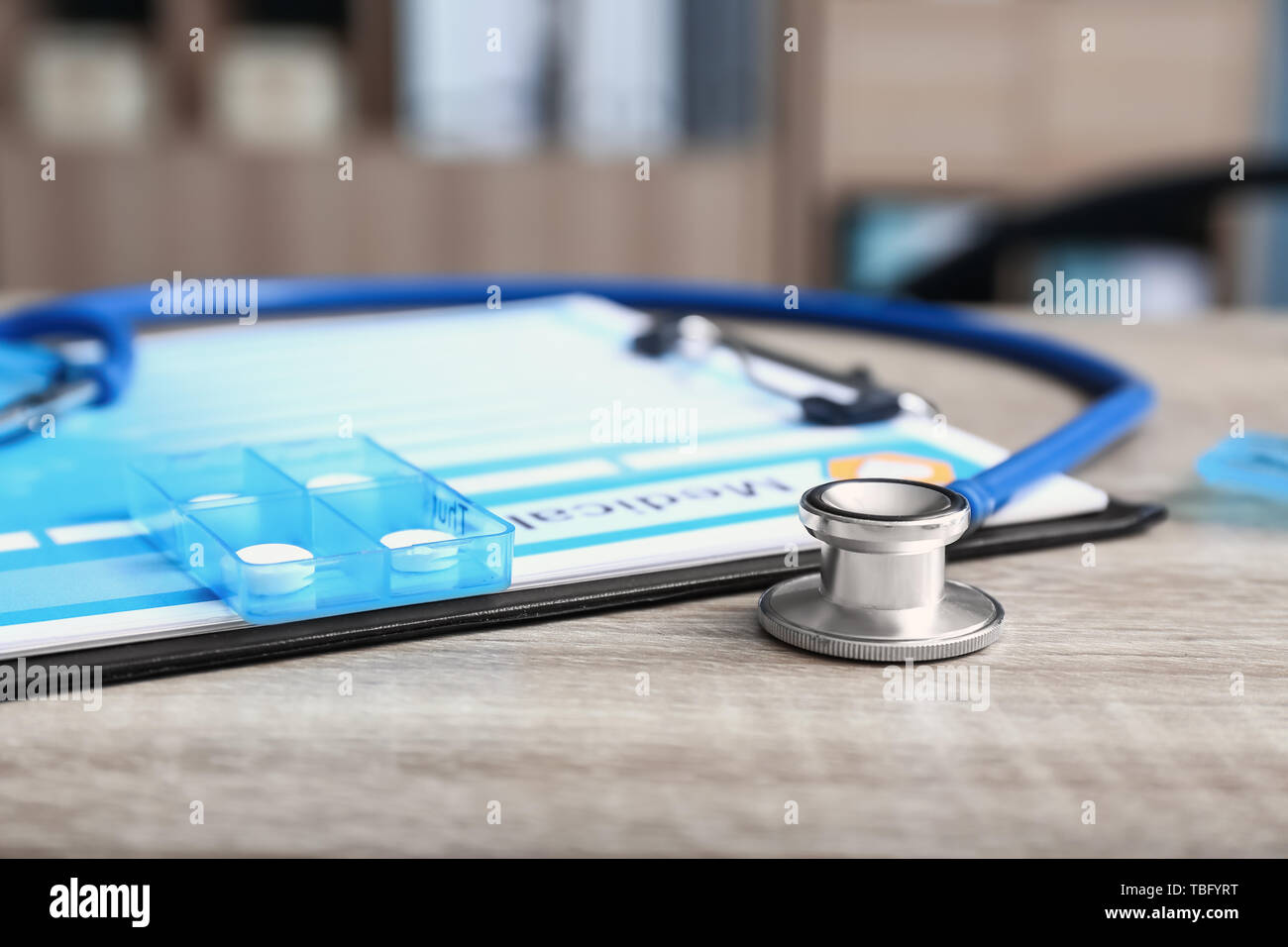 Stethoscope and medical record on table in clinic, closeup Stock Photo ...