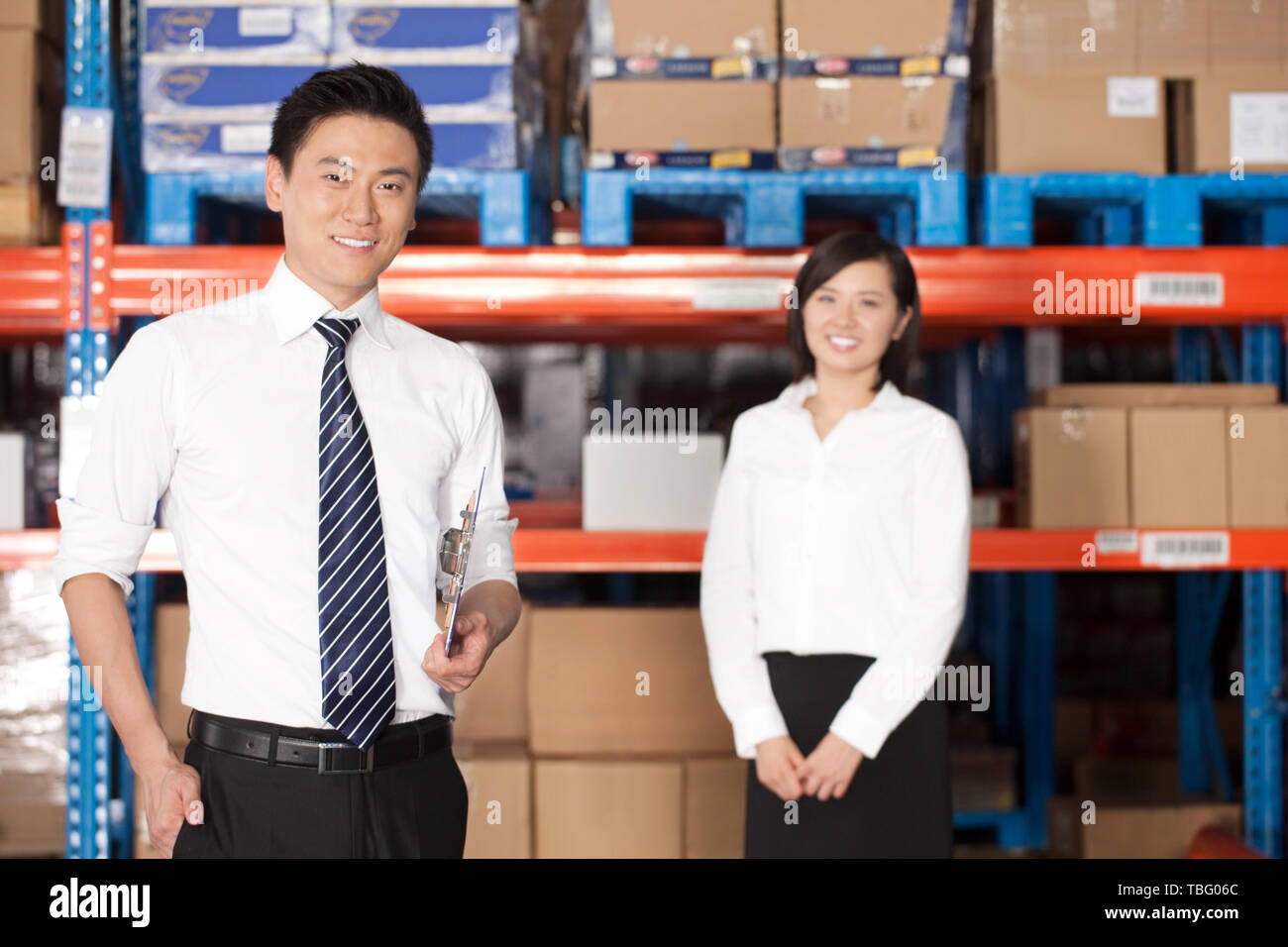 Old woman stacking shelves hi-res stock photography and images - Alamy