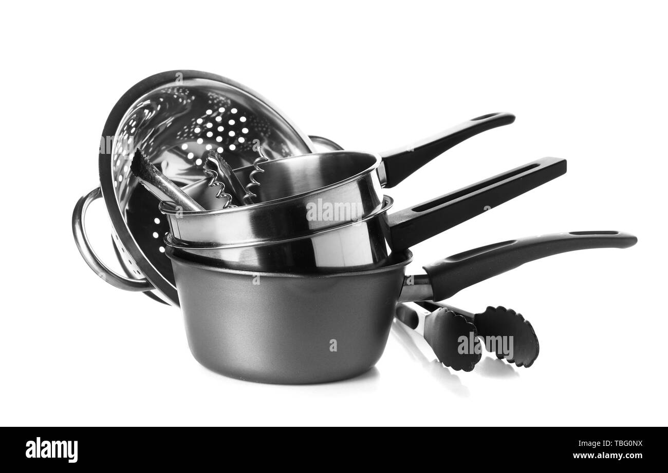 Set of stainless steel utensils on white background Stock Photo - Alamy