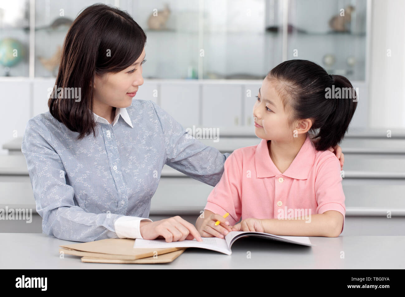 Interaction between teachers and students Stock Photo - Alamy