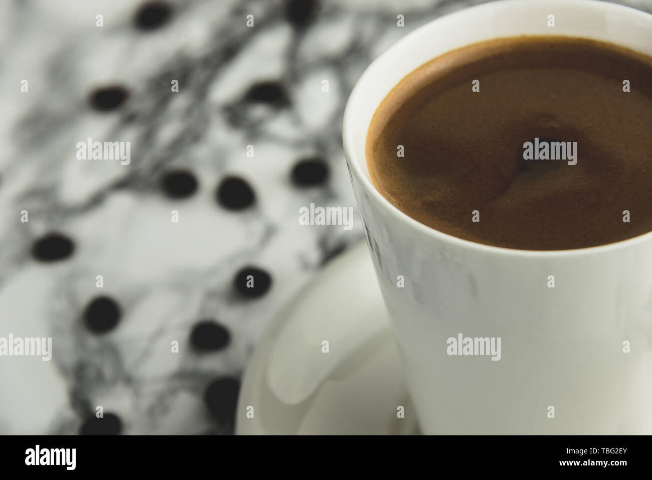 Front view of a delicious and tasty cup of freshly made coffee with ...