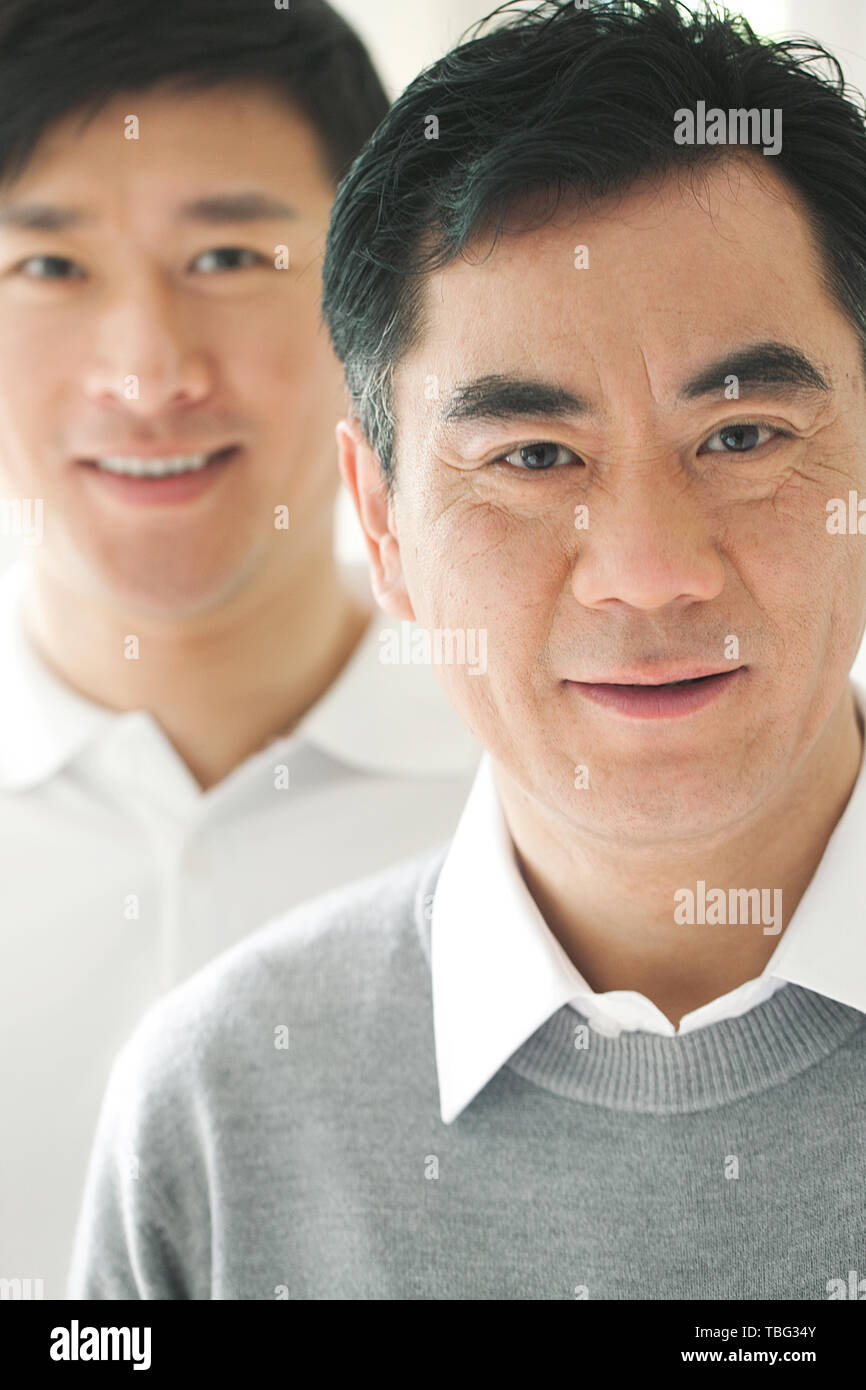 A portrait of a father and son Stock Photo - Alamy