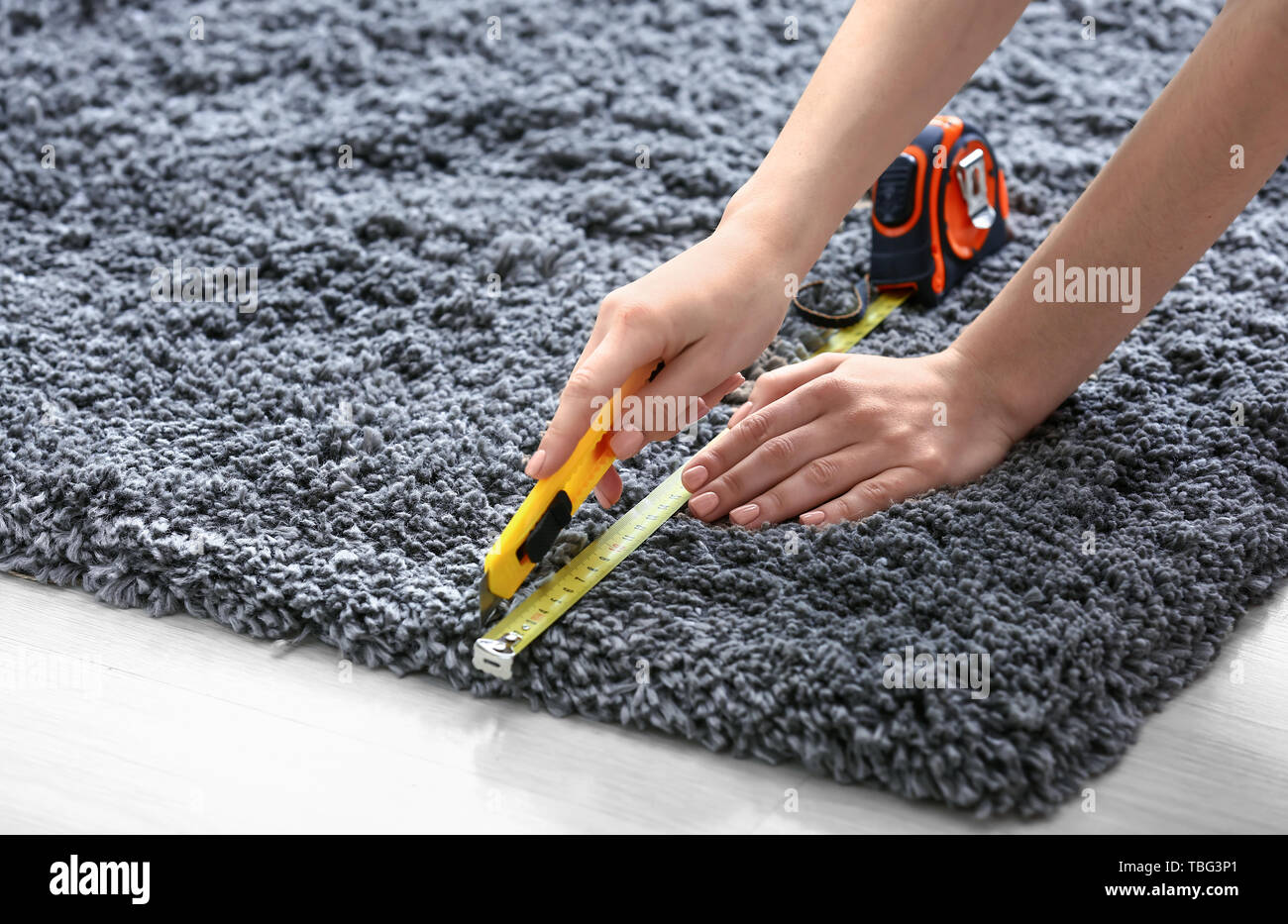 Rug cutter hi-res stock photography and images - Alamy