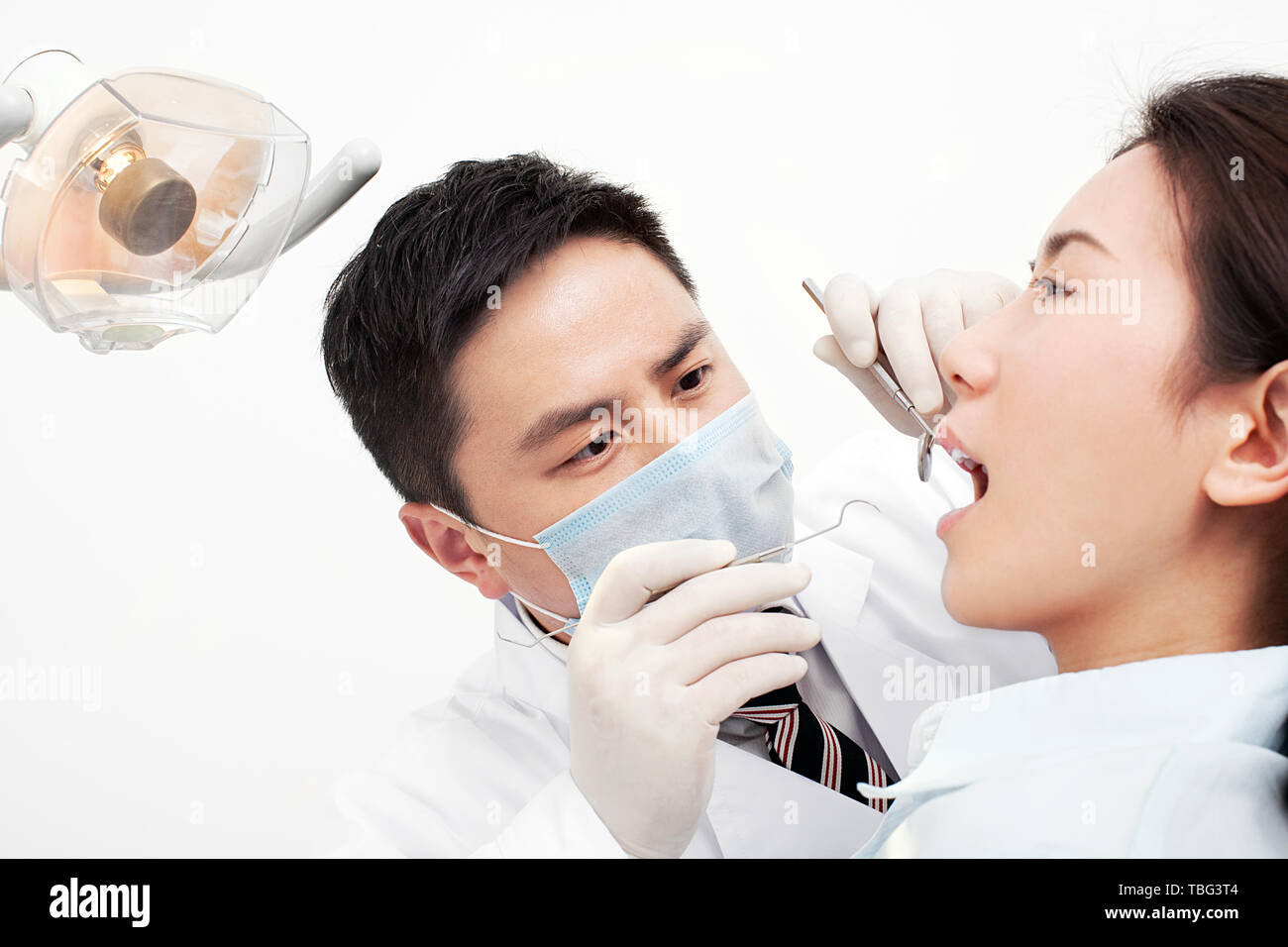 Oral examination in the clinic Stock Photo - Alamy
