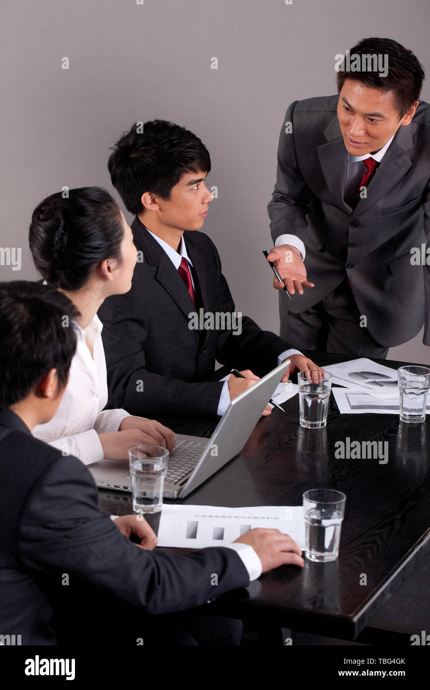 A team is meeting in a conference room Stock Photo - Alamy