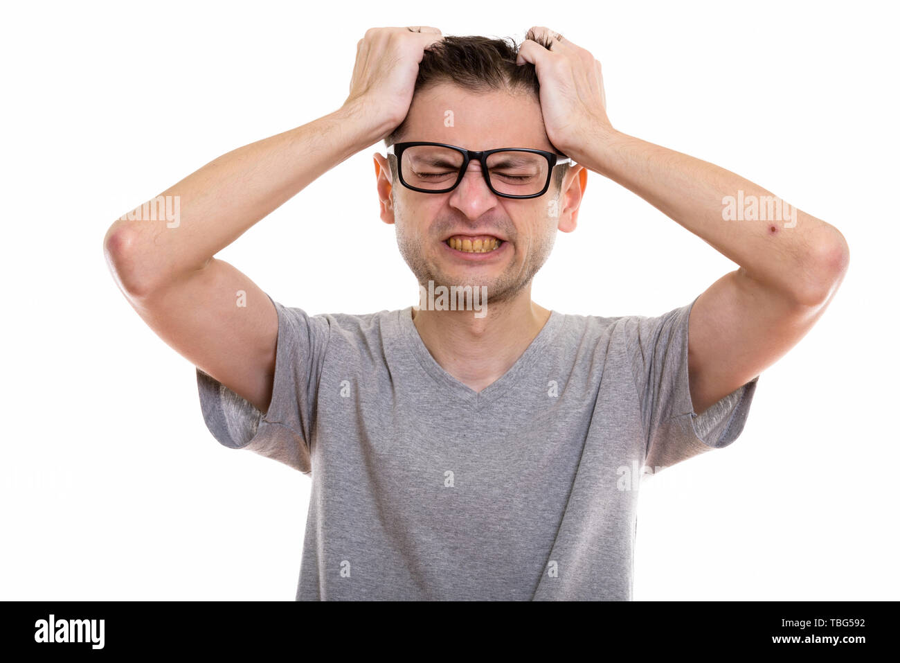 Studio portrait of man isolated against white background Stock Photo ...