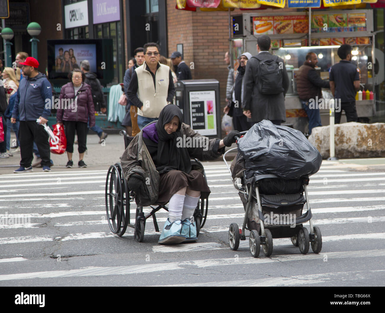 A Really Tough Older Disabled Homeless Woman Crosses 8th Avenue At 42nd