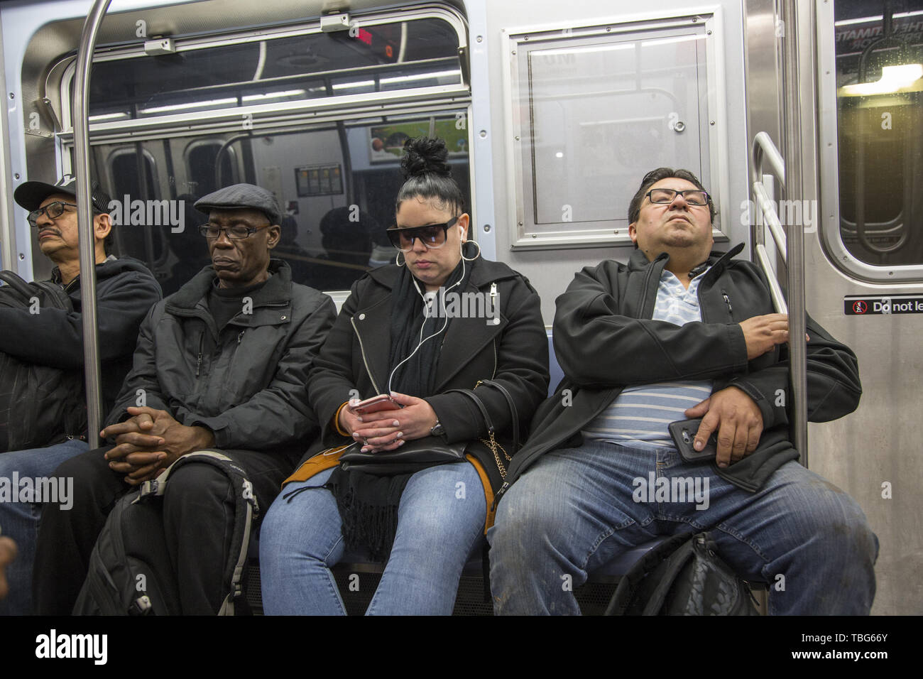 People ride a subway train in midtown Manhattan, New york City Stock ...