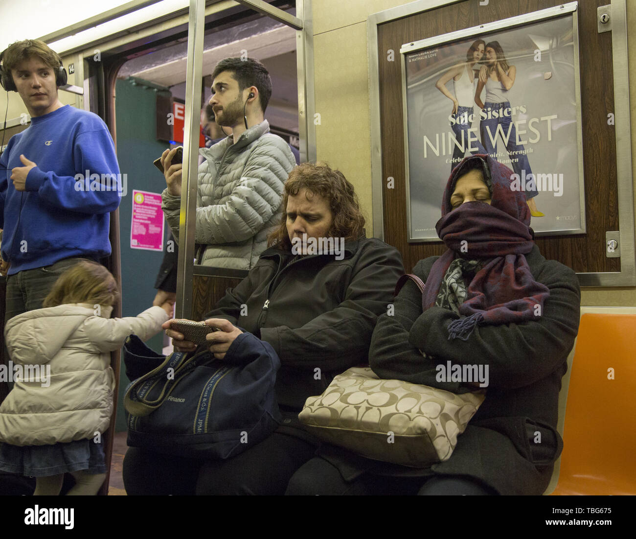 People ride a subway train in midtown Manhattan, New york City Stock ...
