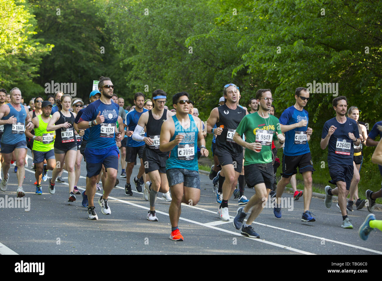 Runners in Prospect Park completing the first leg of the Brooklyn 1/2 ...