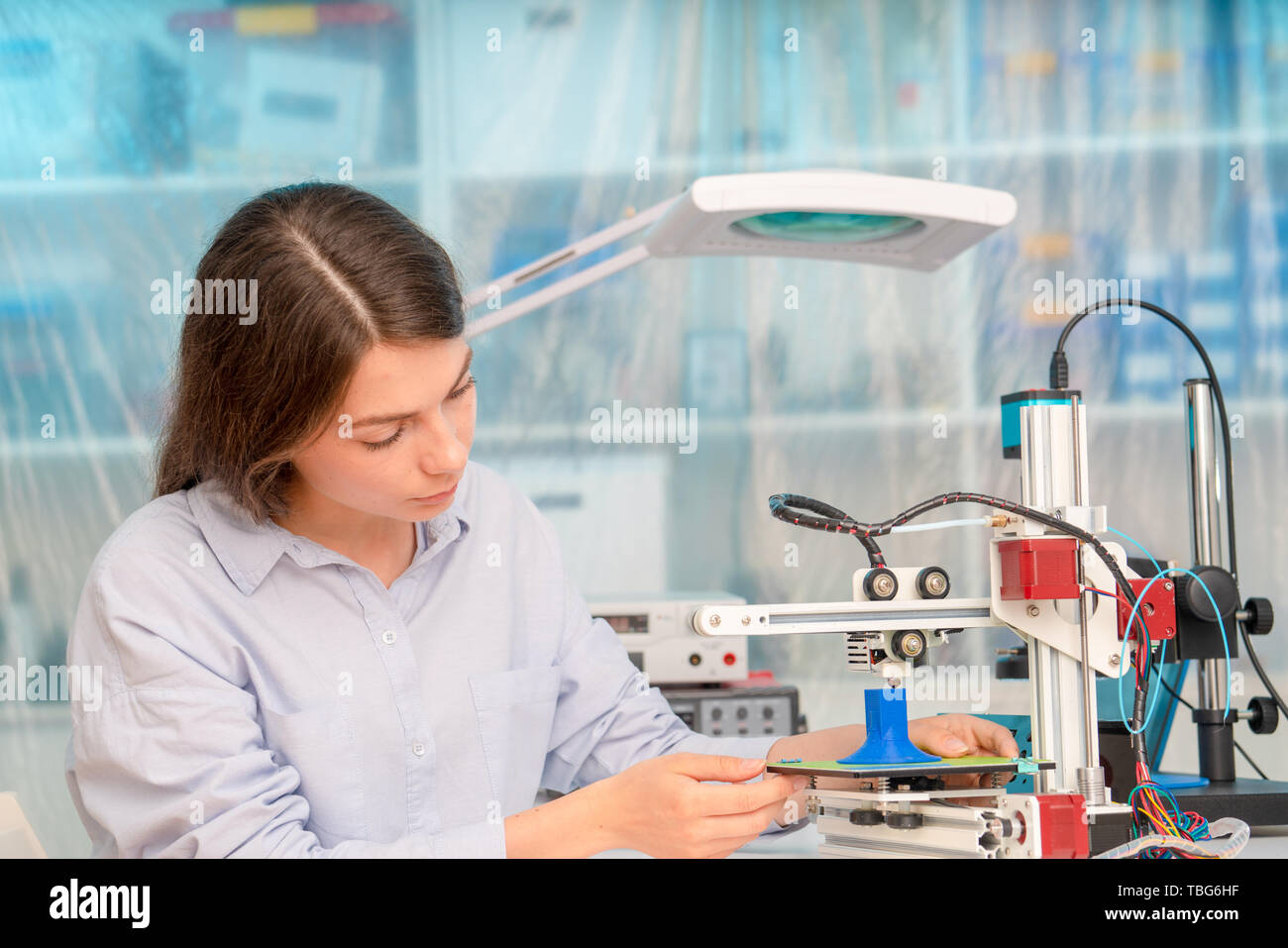 A student girl print prototype on 3D printer Stock Photo - Alamy