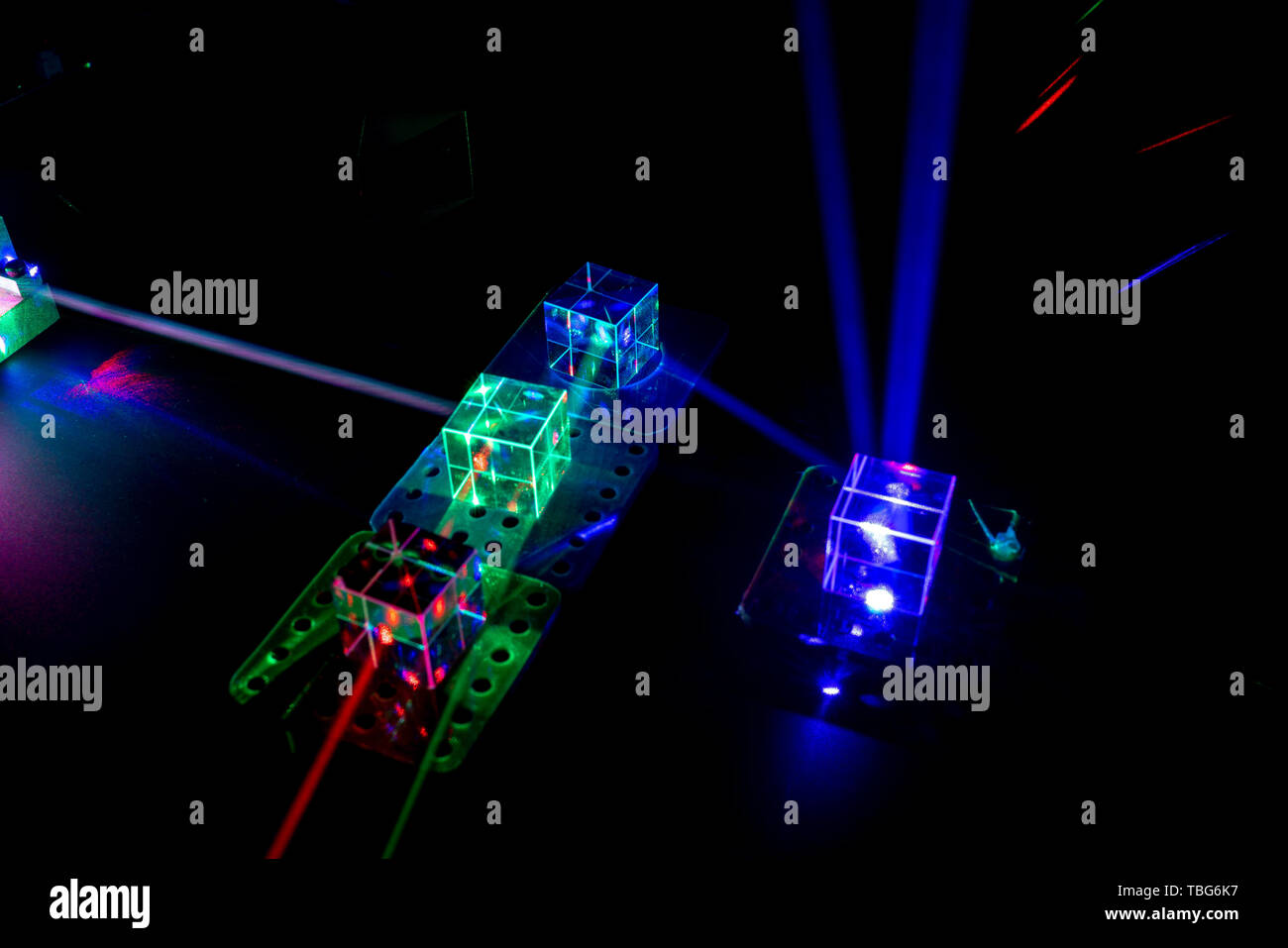 Laser beams in the laboratory of optical physics Stock Photo - Alamy