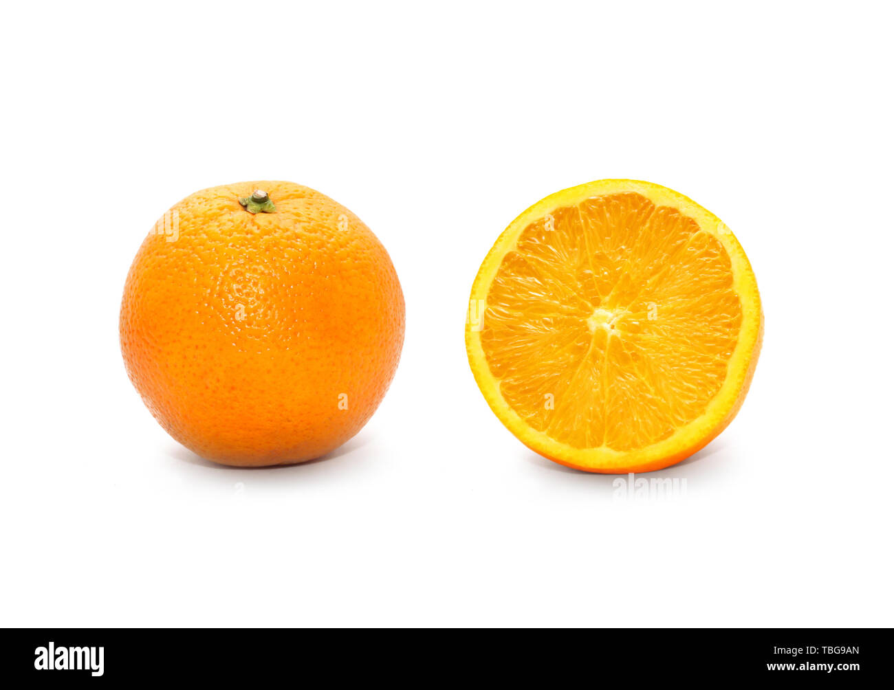 two oranges on a white background Stock Photo - Alamy