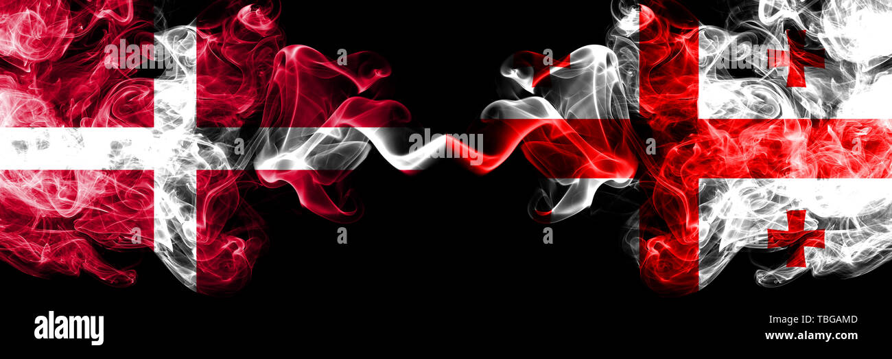 Denmark, Georgia competition thick colorful smoky flags. European ...