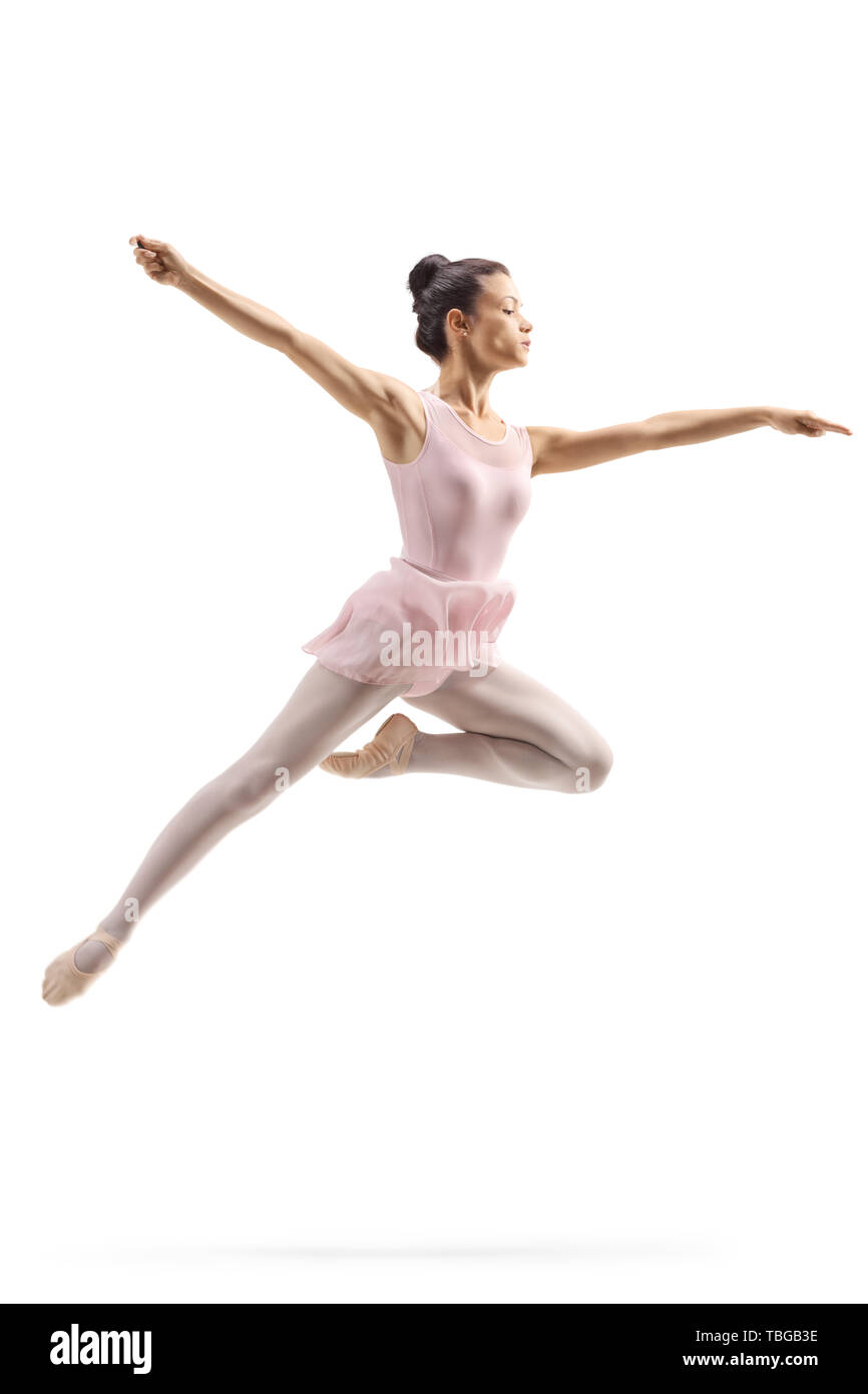 Full length shot of a female ballerina performing a jump isolated on ...