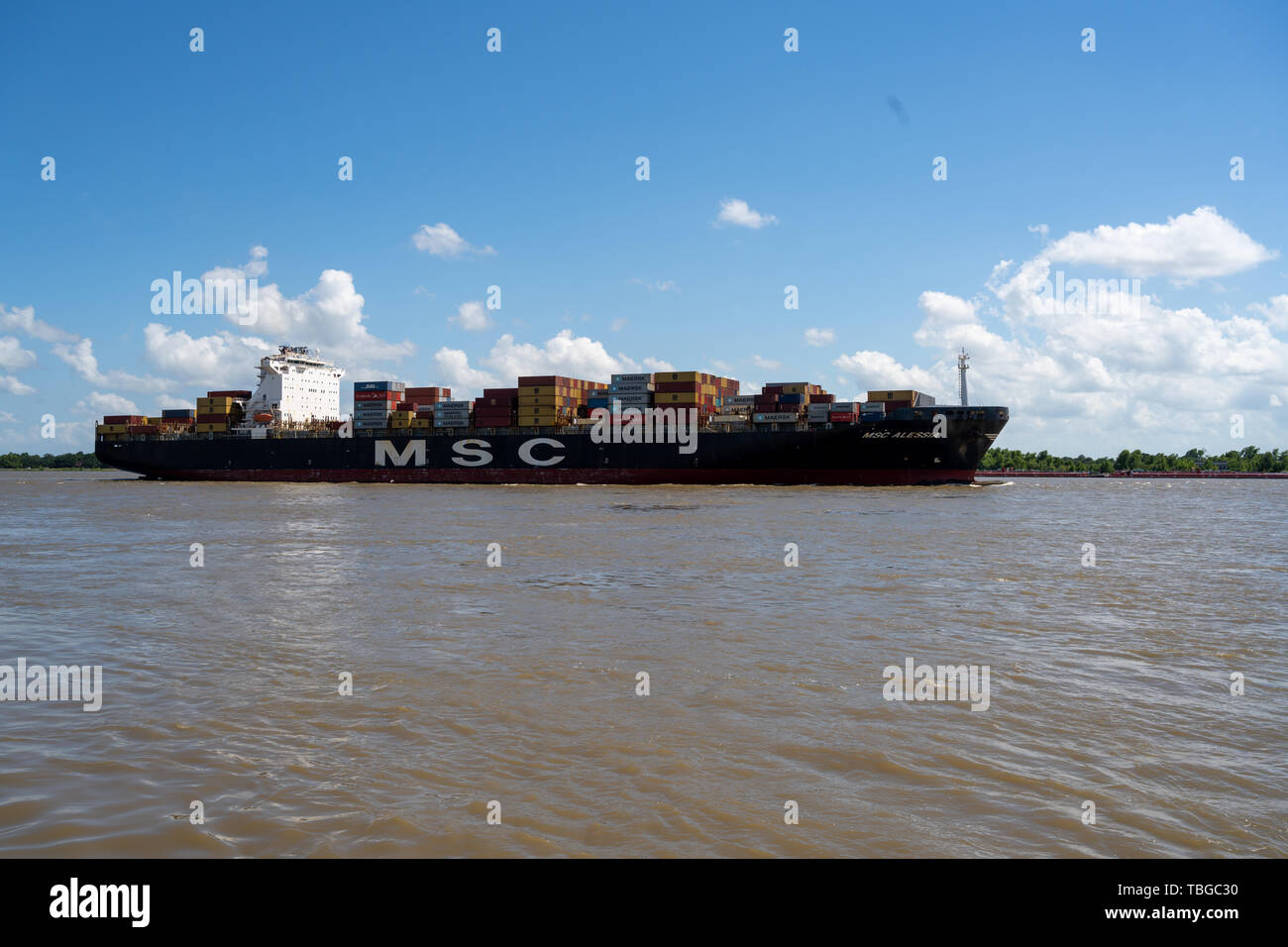 New Orleans, LA, USA -- May 24, 2019. An MSC container ship travels ...
