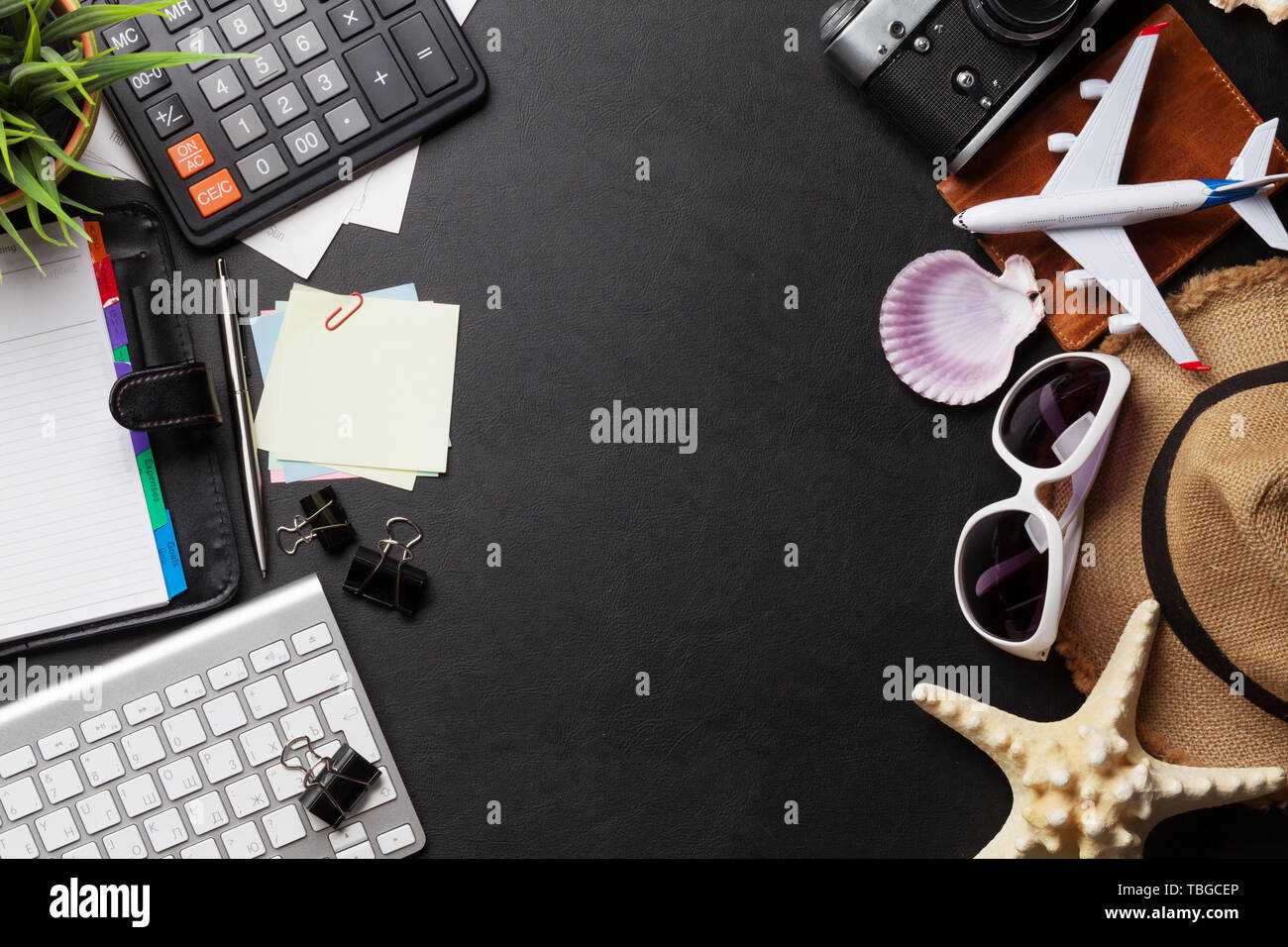 Business travel trip concept. Accessories on desk table. Pc keyboard ...
