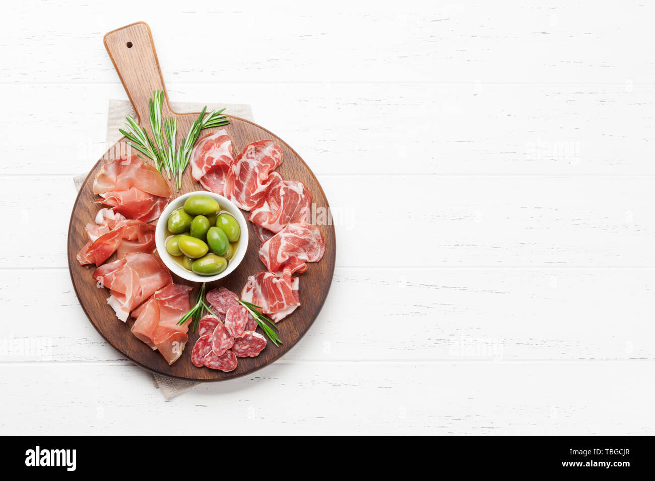 Traditional spanish jamon, prosciutto crudo, italian salami, parma ham ...