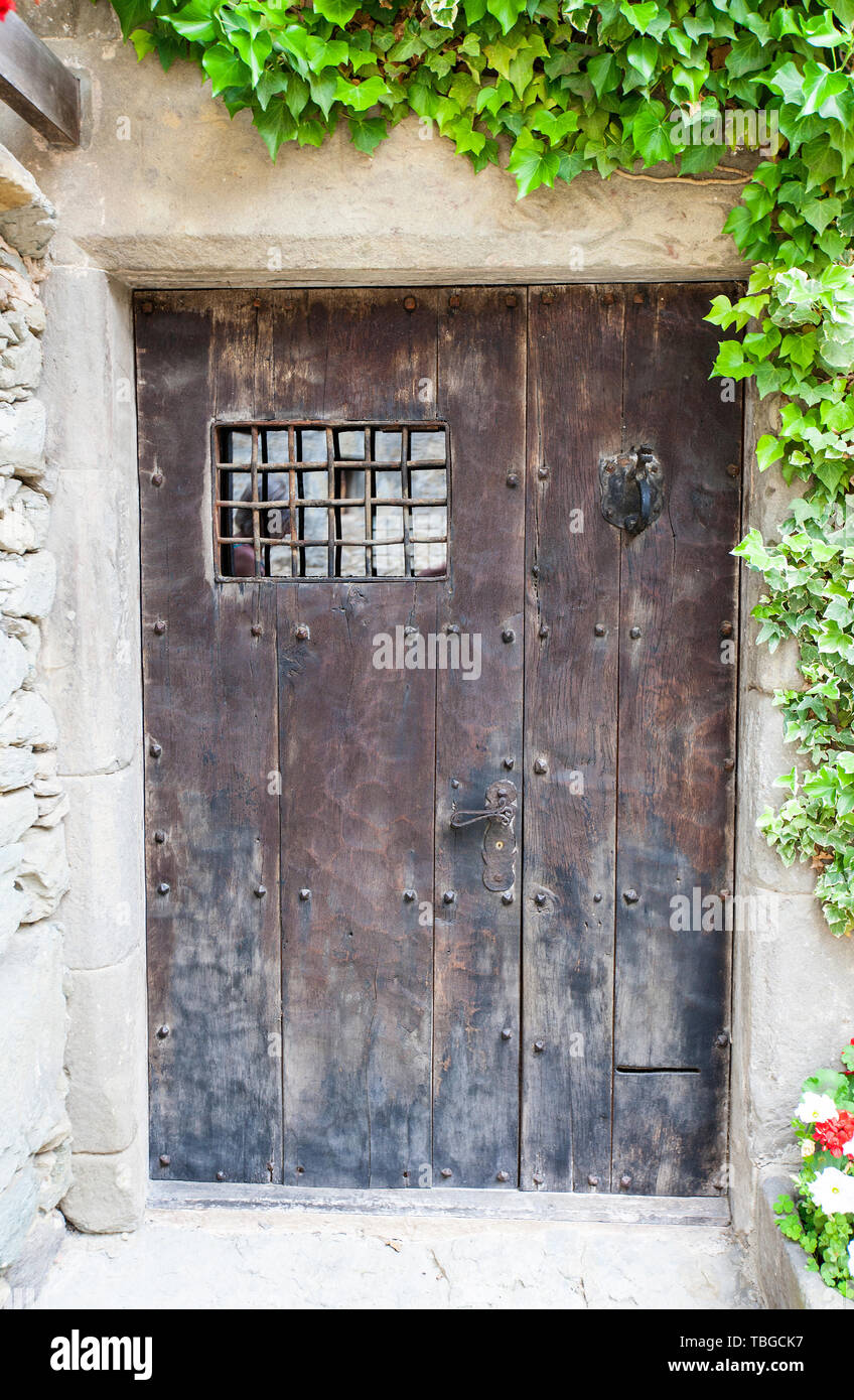 ancient wooden door with a lattice and a stone staircase Stock Photo ...