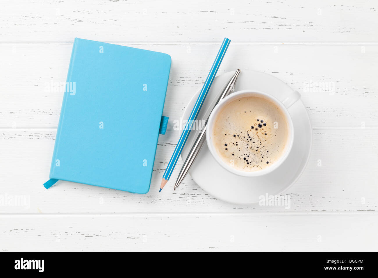 Office workplace table with coffee cup and supplies. Flat lay. Top view ...
