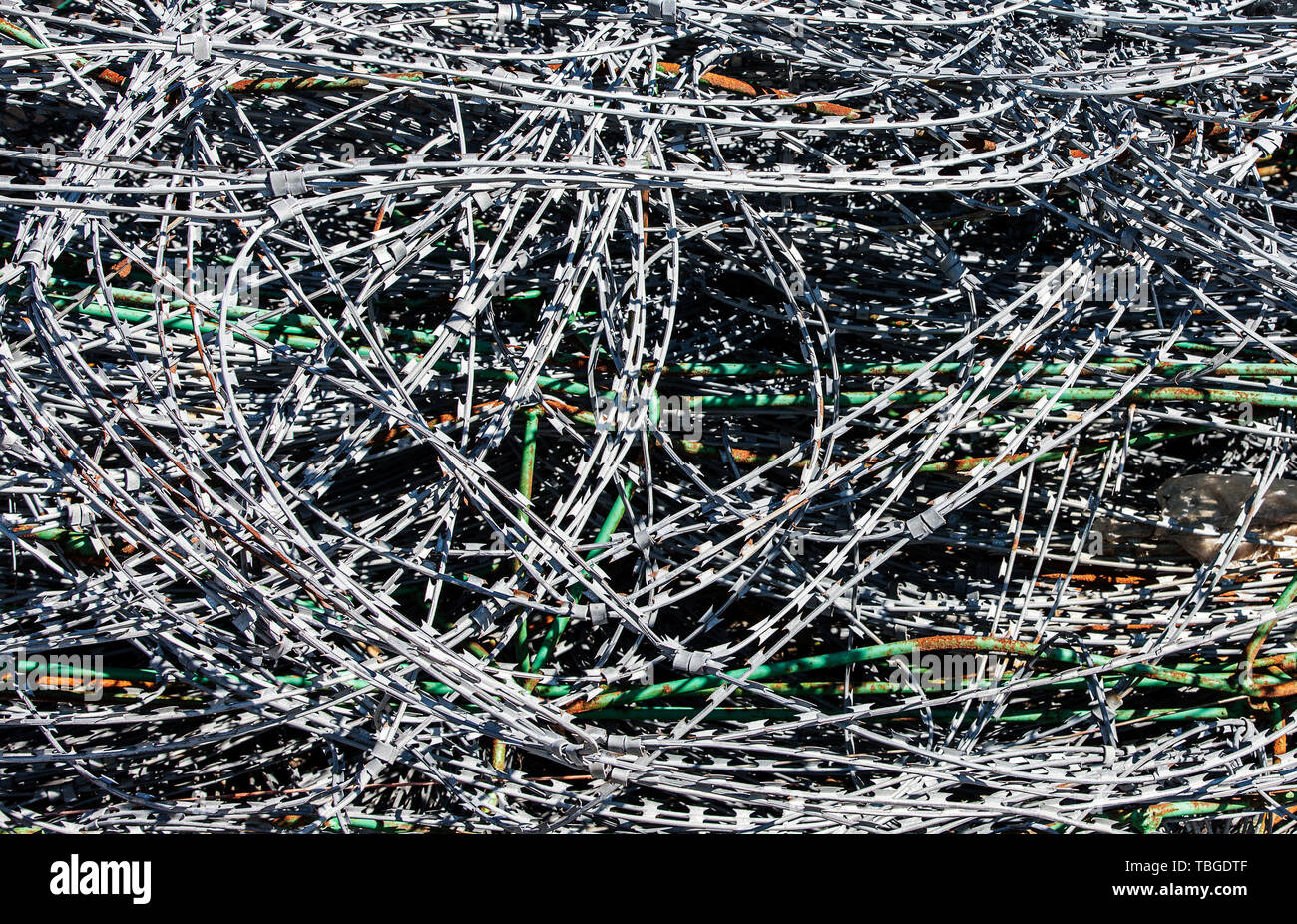 pile of old rusty and new barbed wire Stock Photo - Alamy