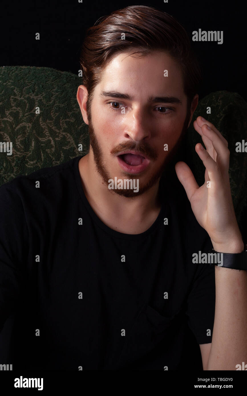 Man posing with his left hand up hi-res stock photography and images ...