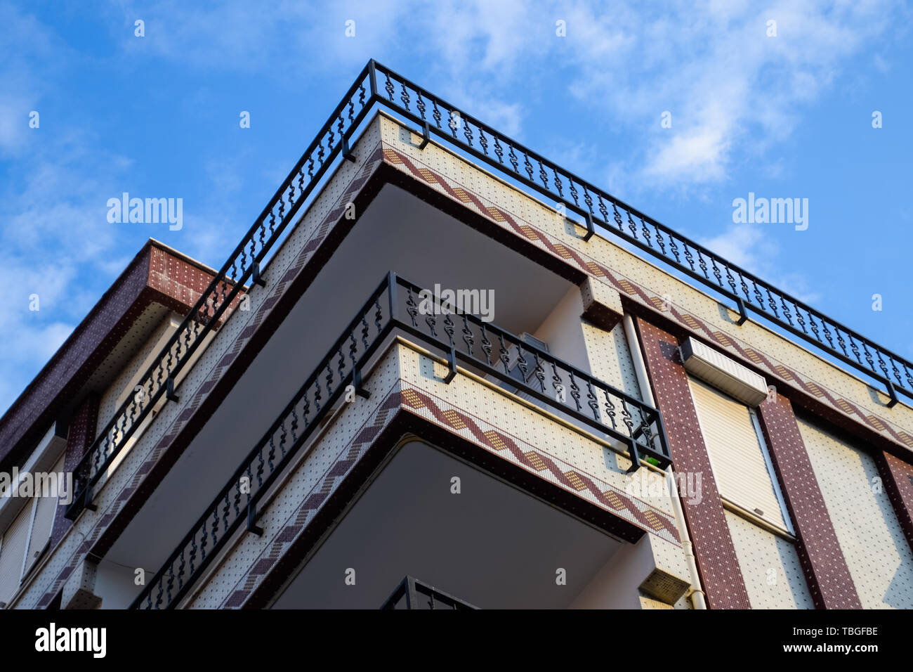 Balconies of a residential high-rise building. Residential buildings in ...