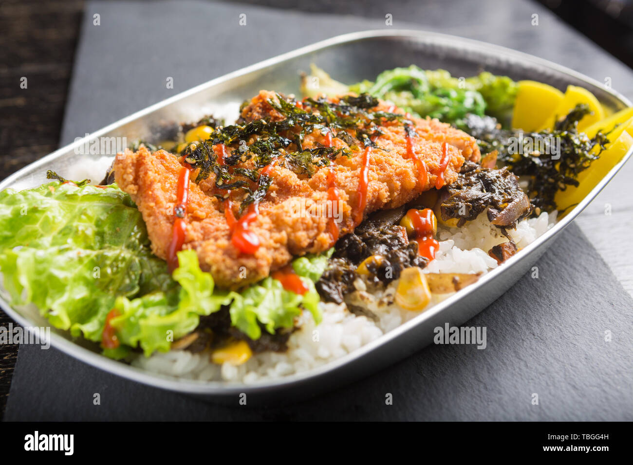 Chicken chop rice Stock Photo - Alamy