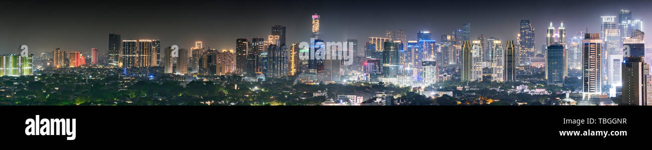 Panoramic Jakarta skyline with urban skyscrapers at night. Jakarta ...