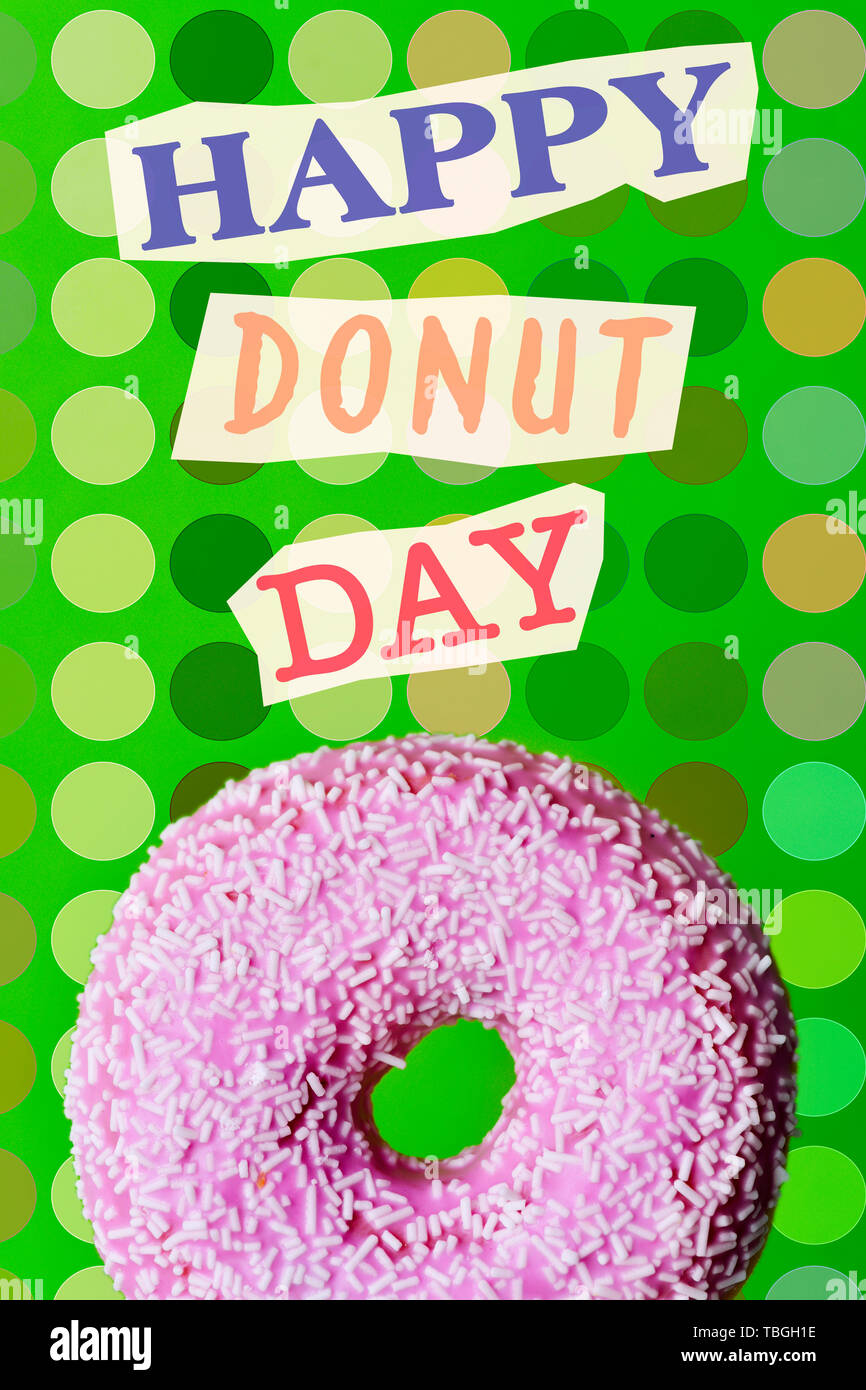 text happy donut day, as magazine cutouts, and a donut, coated with a ...