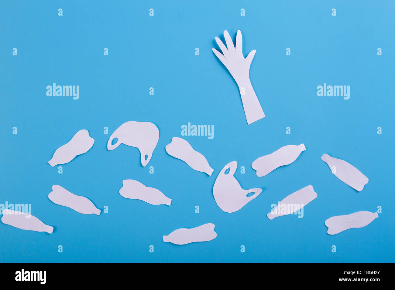 ocean plastic pollution issue. man sinking in plastic Stock Photo - Alamy