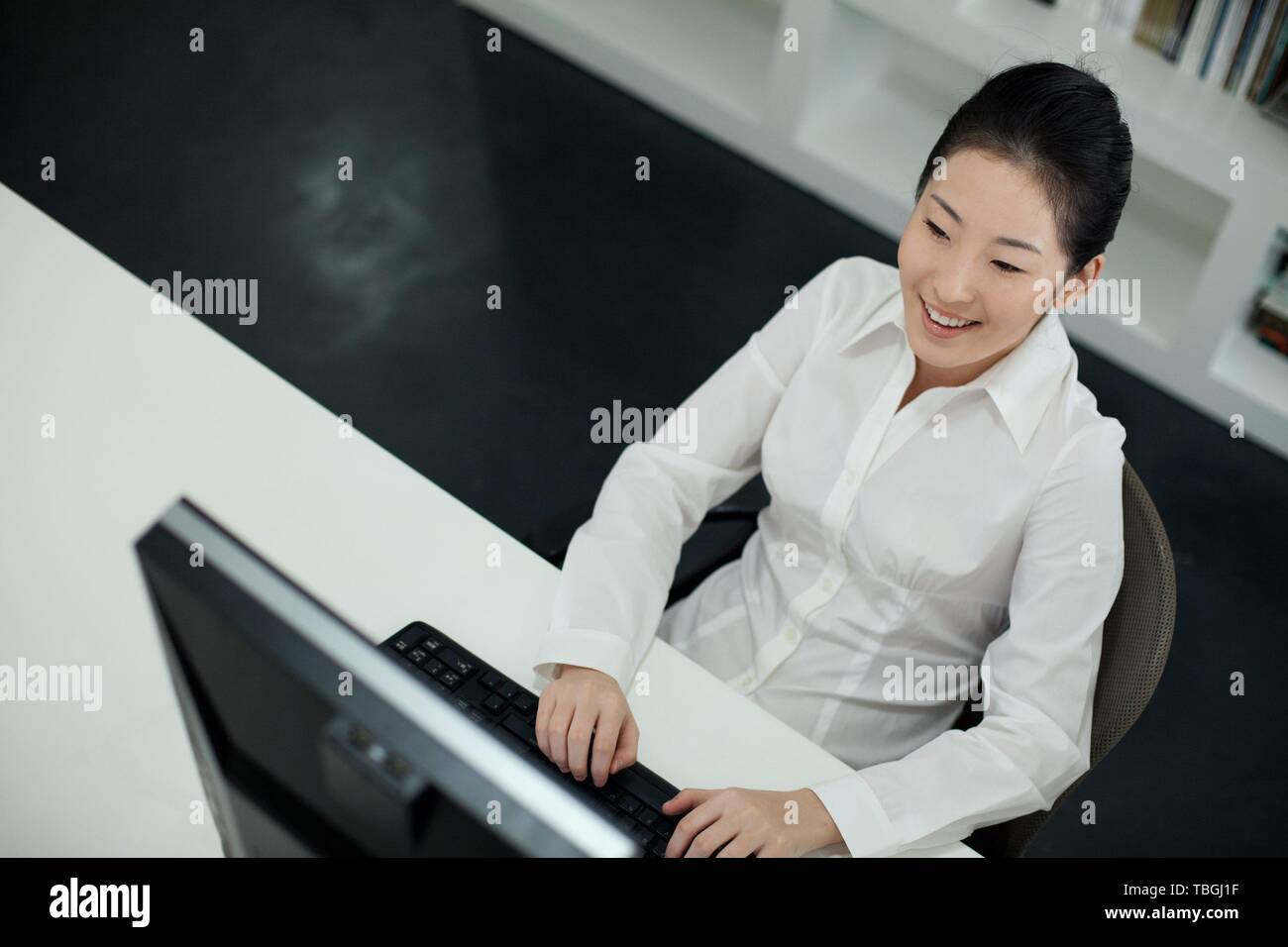 Business woman secretary typing hi-res stock photography and images - Alamy
