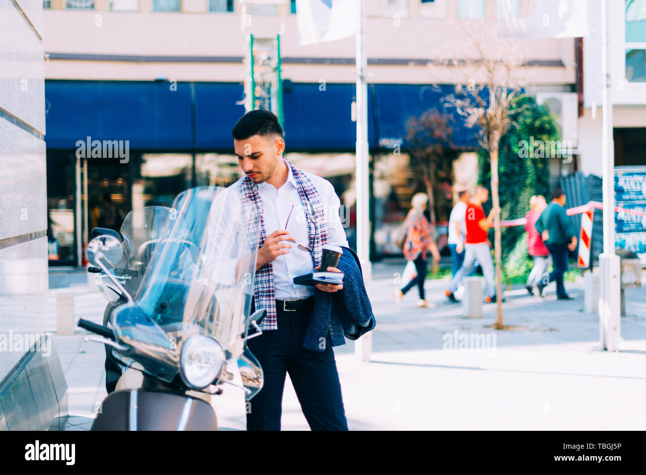 Modern businessman checking out hi-res stock photography and images - Alamy