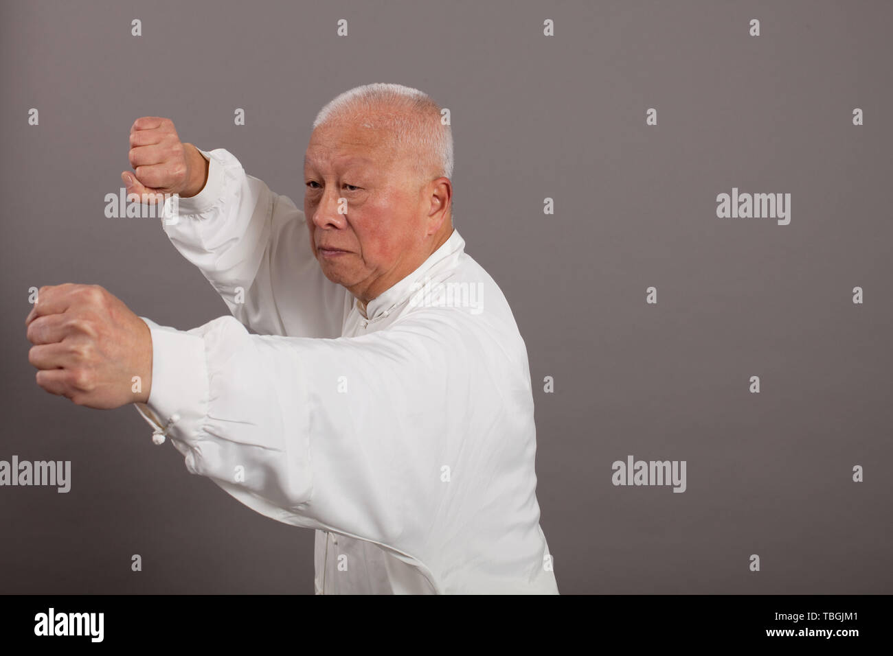 Elderly chinese man exercise stretch hi-res stock photography and ...