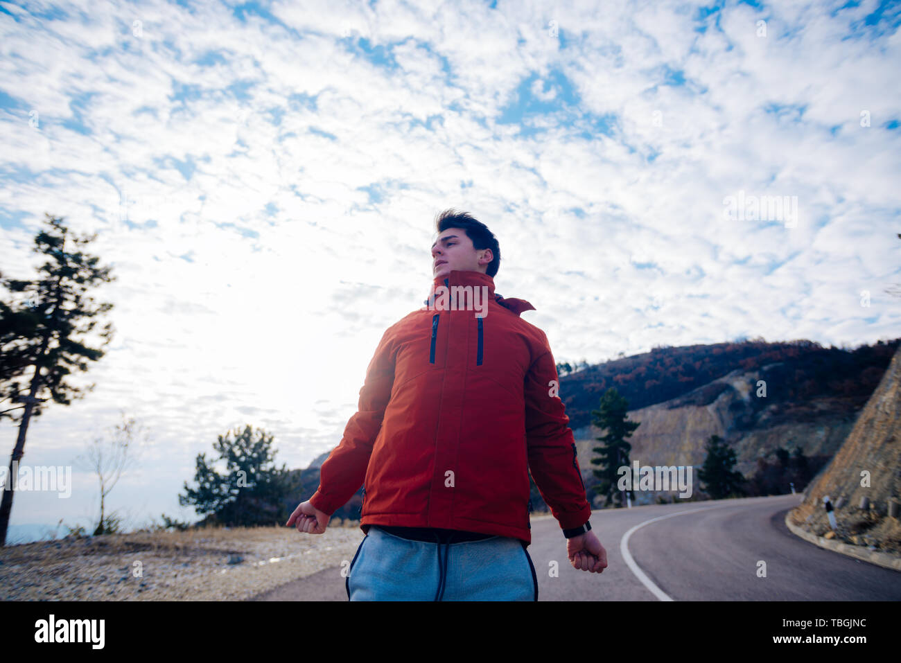 Fit masculine men stretching in the morning and preparing for exercise ...