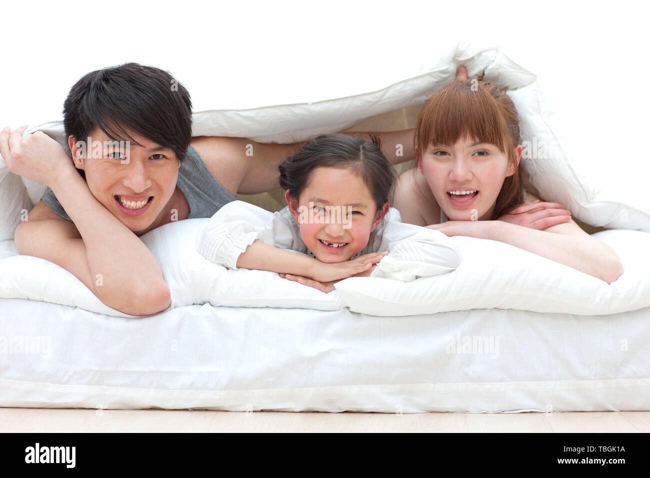 family of three Stock Photo - Alamy